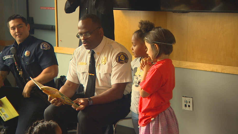 Seattle firefighters read to kids at Beacon Hill library | KOMO